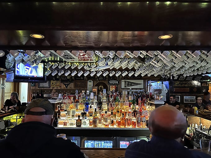 The bar at Whitey's doesn't just serve drinks; it serves possibilities, all lined up in amber bottles catching the light.