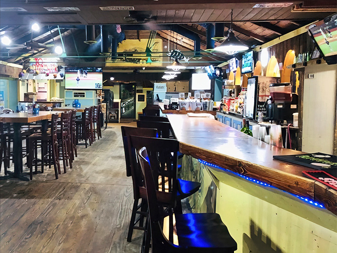 The bar area invites lingering conversations over cold drinks and even warmer hospitality from friendly staff.