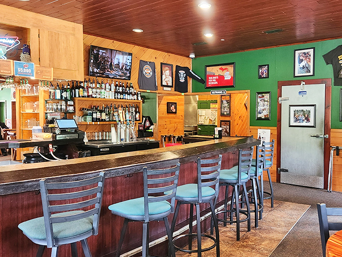 A bar that speaks the three essential languages of Northern Michigan: wood, beer, and sports on TV.