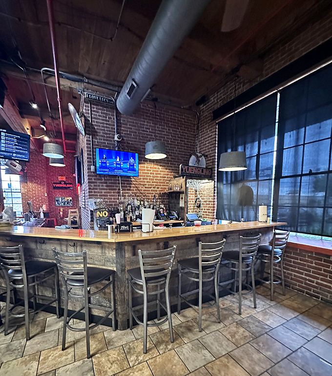 The bar at Sweet Lucy's: where bourbon and barbecue create the kind of friendship that poets would write about if their fingers weren't sticky with sauce.