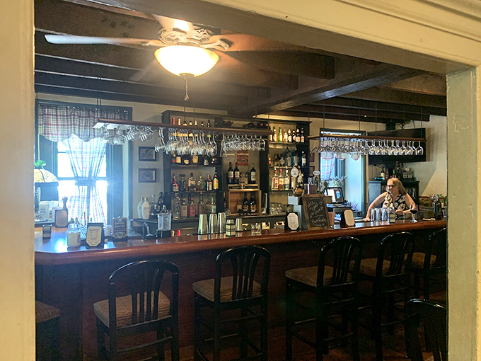 A bar that beckons with the silent promise that whatever happened today, a good drink and conversation await.