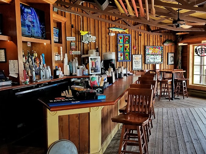 The bar area offers front-row seats to beverage artistry. Perfect for those "I'll just have one drink" promises you won't keep.