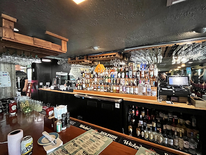 Liquid artistry in progress! This well-stocked bar promises creative concoctions that pair perfectly with ocean views and the day's freshest catch.