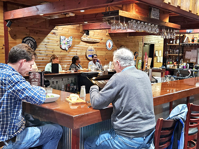 The bar area invites regulars and newcomers alike, where friendly conversation flows as freely as the drinks.