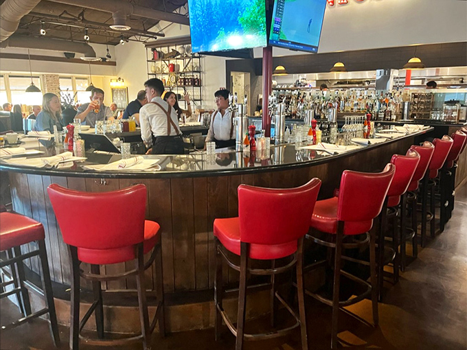 The bar isn't just serving drinks&mdash;it's orchestrating liquid happiness with bartenders as the talented conductors.