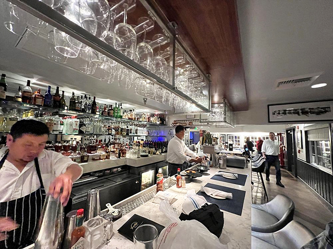 The bar&mdash;where mixology meets marine biology, and bartenders craft cocktails with the precision of seasoned sailors.