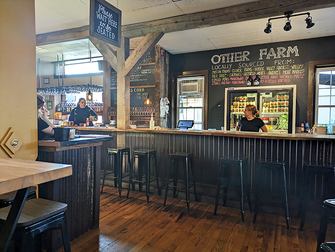 Behind the corrugated metal bar, local brews flow from taps while chalkboard menus highlight the "locally sourced" philosophy that drives this Pennsylvania gem.