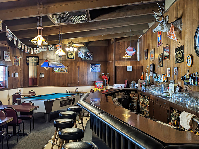 The bar area offers a different kind of mountain view&mdash;taxidermy and pool tables creating that authentic small-town watering hole experience.