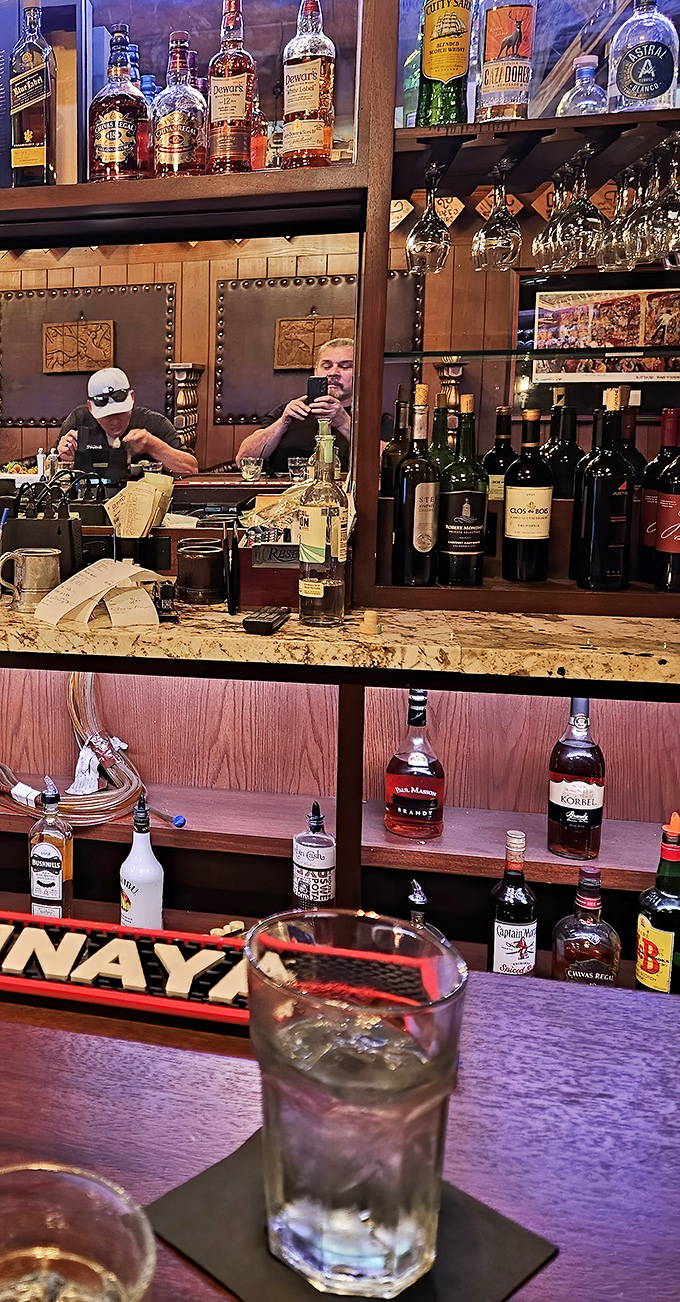 Behind the bar, liquid treasures await &ndash; from whiskey to wine, the well-stocked shelves promise the perfect pairing for your carnivorous adventure.