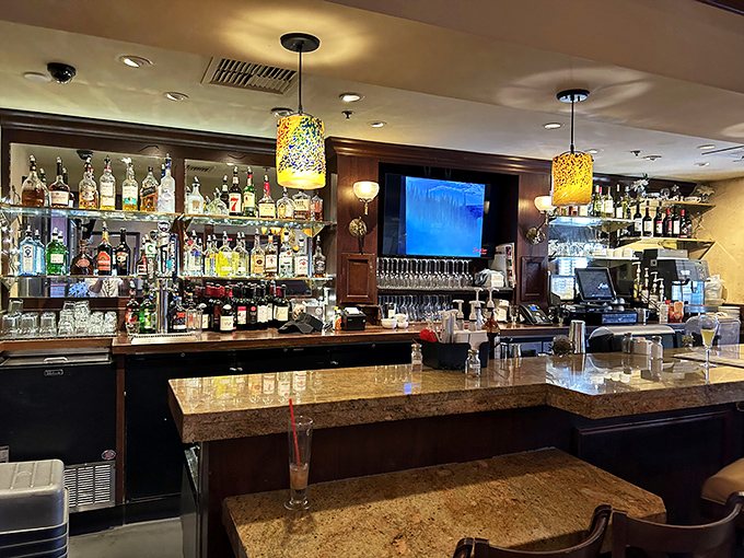 A bar that understands sometimes Tuesday requires a cocktail too. The amber glow of those pendant lights flatters everyone's "I just ordered another round" face.