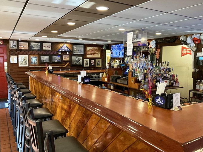 A well-stocked bar stands ready to fuel conversations and complement every perfectly seasoned crab cake.