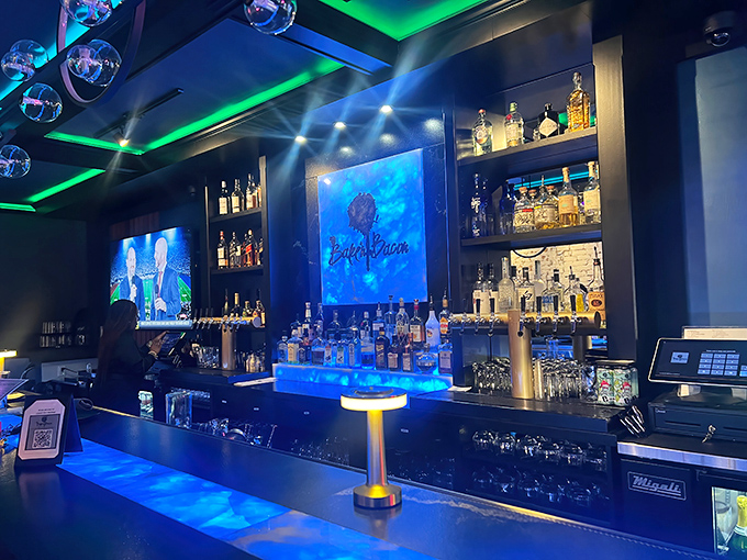 The bar's blue-green glow creates an atmosphere where ordering another round seems like the only reasonable decision you could make.