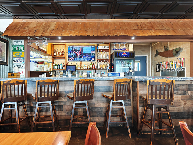 The bar area&mdash;where solo diners become regulars and regulars become family. Those wooden barstools have witnessed countless "first bite" expressions of pure joy.