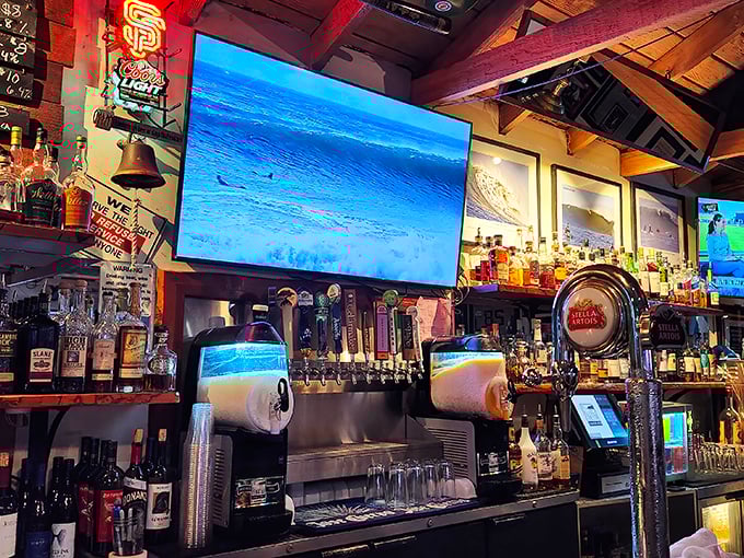 The kind of bar where the ocean plays on screens while bartenders pour liquid courage for those brave enough to surf Mavericks tomorrow.