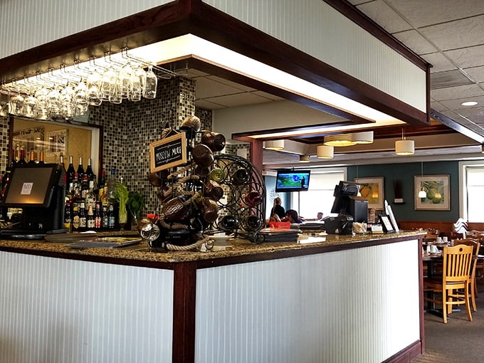 The bar area: where breakfast meets cocktail hour, and nobody judges you for ordering either at any time of day.