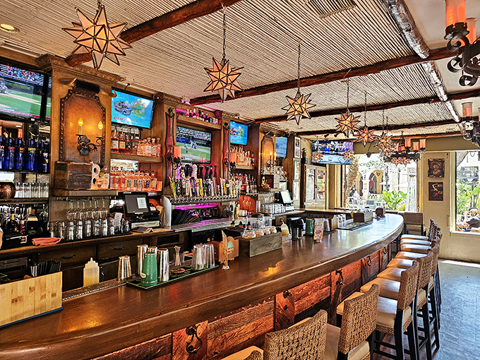 Star-shaped lanterns dangle from the ceiling like celestial bodies, watching over a bar stocked with more tequila varieties than most have socks.
