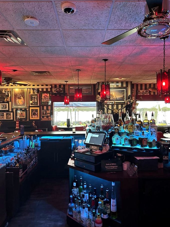 The bar glows with bottles backlit like treasures in a museum, except here you're encouraged to sample the exhibits.