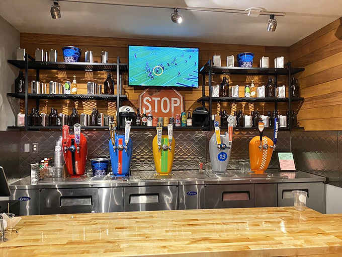 A bar that understands its mission: deliver cold beer to accompany hot barbecue. Those colorful taps are like a rainbow leading to meaty treasure.