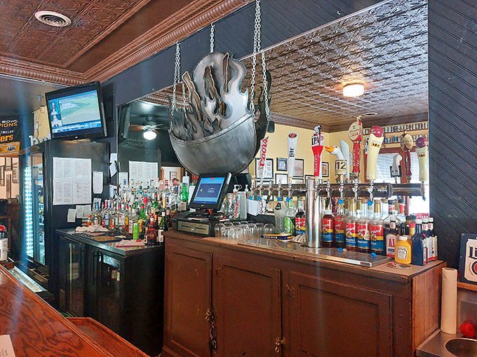 The bar area's hanging kettle light fixture hints at the alchemy happening in Wagner's kitchen where ordinary meat becomes extraordinary.