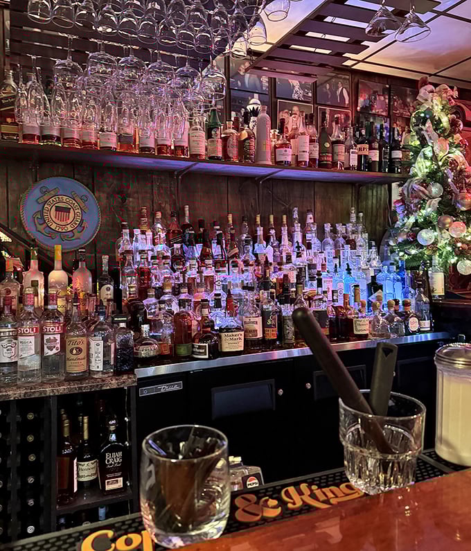 A bar stocked like Fort Knox, if Fort Knox stored liquid happiness instead of gold. The brandy Old Fashioned stands guard.