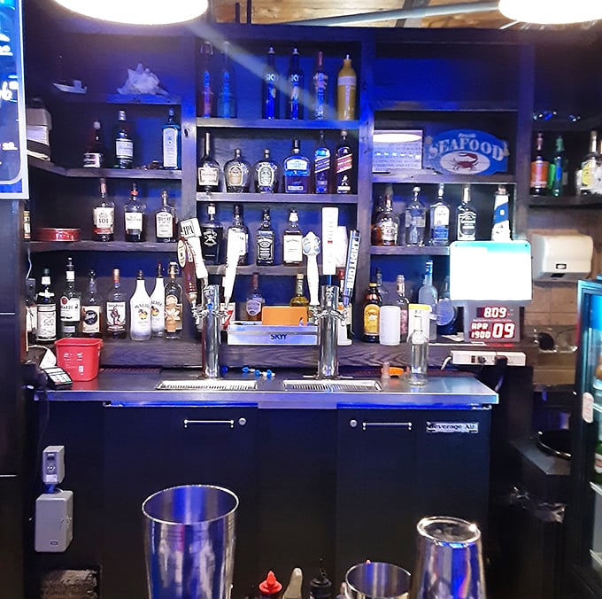 The bar stands ready to provide liquid courage for those attempting their personal best in crab leg consumption.