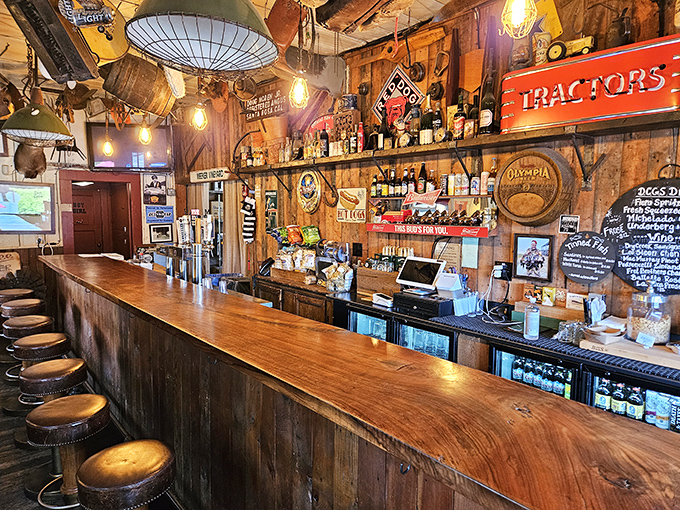 The bar area could tell stories that would make Hemingway reach for his notebook – worn wood, vintage signs, and stools that have supported generations.