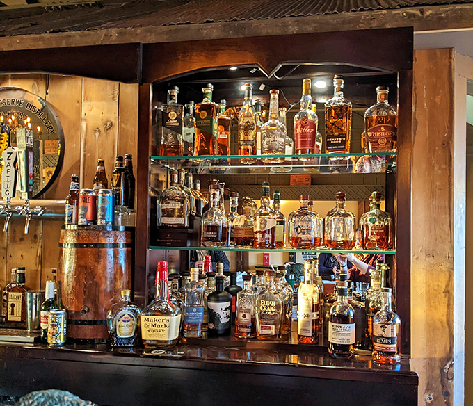 The well-stocked bar could make even the most hardened criminal reform their drinking habits. Bourbon behind bars never looked so good.