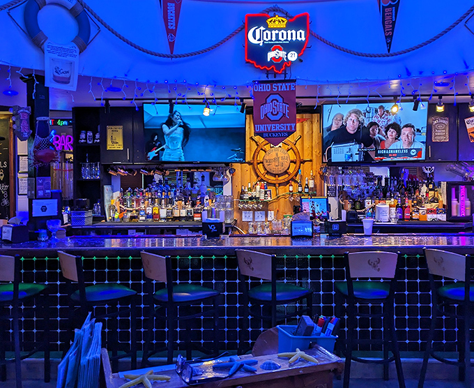 The bar glows with an otherworldly blue light, as if signaling to thirsty sailors. Ohio State memorabilia reminds you that while the food is Cajun, the heart is pure Buckeye. 