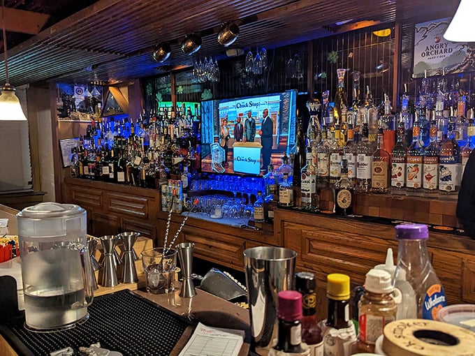 A bar stocked like it's expecting a small nation to drop by for happy hour—liquid happiness in every shade and proof.