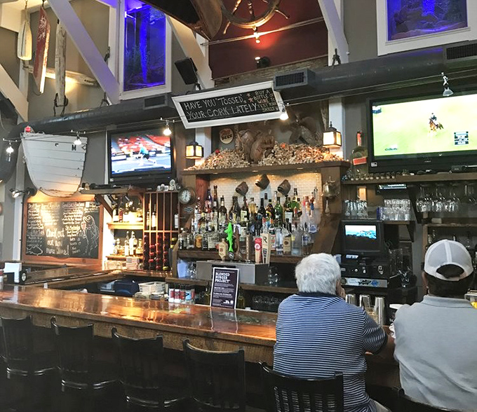 Mounted fish keep watchful eyes on diners, silently approving your excellent taste in seafood establishments.