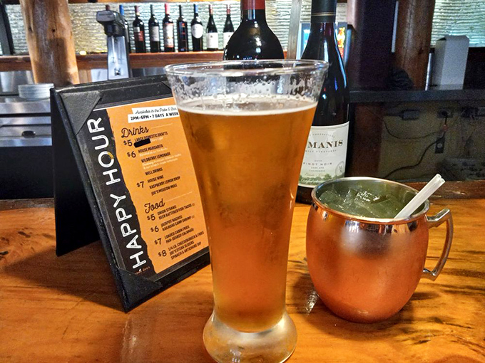 Happy hour done right&mdash;a tall, cold beer alongside a copper mug Moscow Mule. This duo has probably launched more great conversations than a therapist's couch.