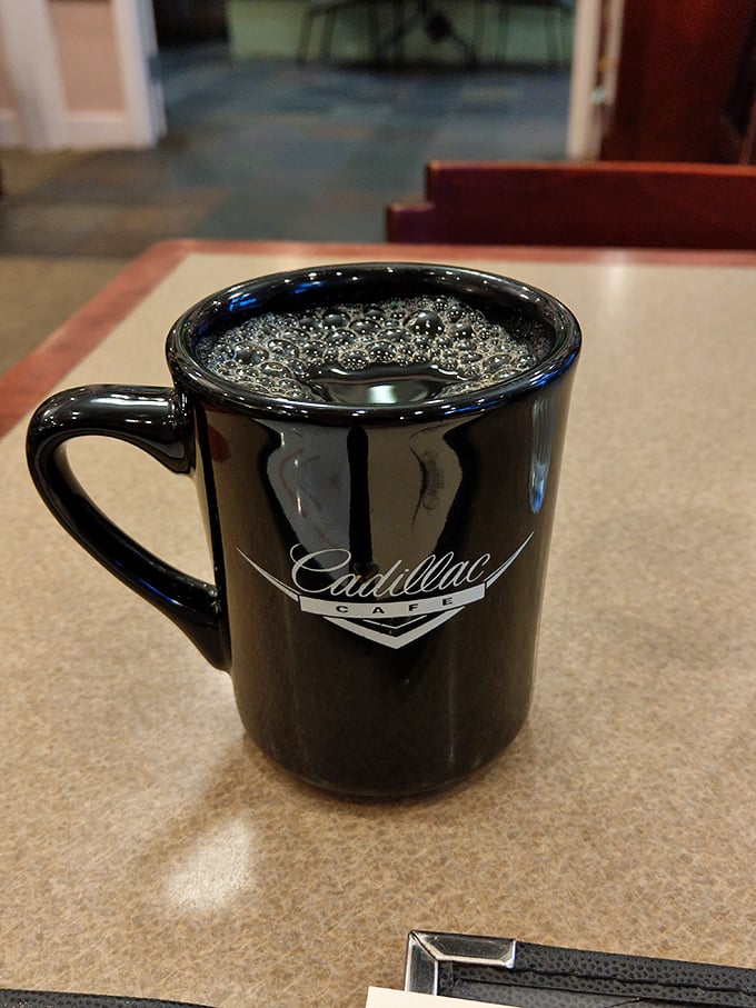 The Cadillac Caf&eacute; mug &ndash; holding liquid motivation that's fueled countless Portland mornings and brilliant conversations.