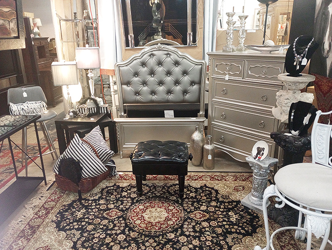 Fifty shades of glamour! This silver-and-charcoal vignette with its tufted headboard would make even the most minimalist decorator reconsider their life choices.