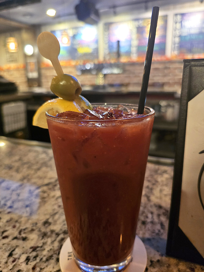 The Bloody Mary arrives with olives standing at attention. This isn't just a cocktail&mdash;it's a liquid brunch with attitude and the perfect weekend salute.