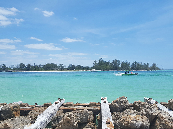 The boat glides through water with more shades of blue than my printer can produce. This is the Caribbean without needing a passport.