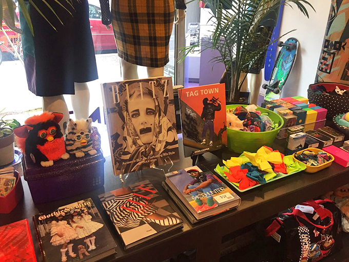 This table display is a millennial's childhood laid bare—Spice Girls, Space Jam, and NSYNC memorabilia that now qualifies as "vintage." Feel old yet?
