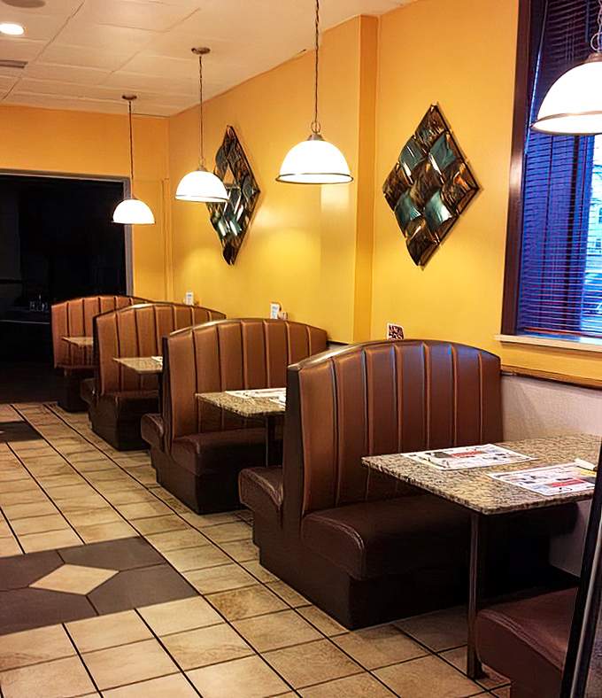 Those brown vinyl booths aren't just seating &ndash; they're front-row tickets to the greatest show on earth: breakfast at a classic American diner.