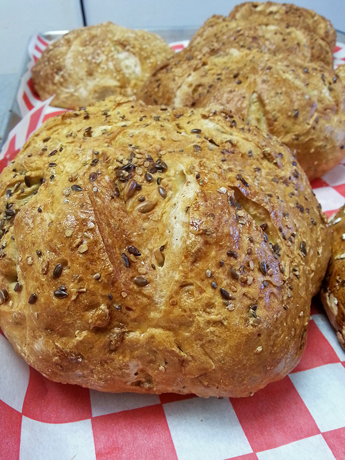 These rustic bread loaves, studded with seeds and sporting perfect crackling crusts, make supermarket bread seem like a sad, distant relative.