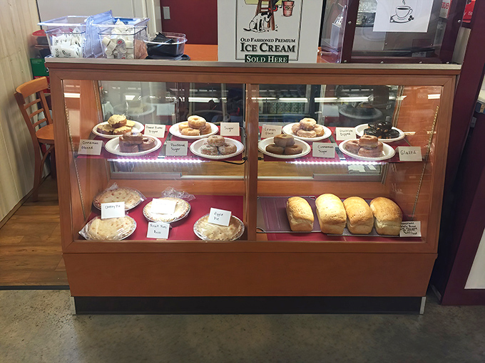 A glass case of temptation showcasing Pennsylvania's baking traditions. These golden-brown creations whisper sweet promises to shoppers with a weakness for carbs.