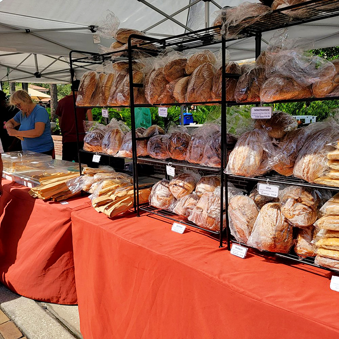 Carb-lovers' paradise: shelves of fresh-baked bread waiting to elevate your sandwich game from ordinary to extraordinary.
