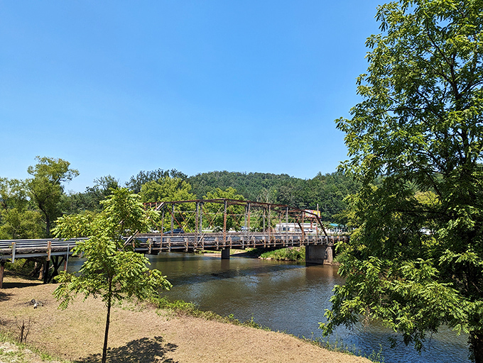 This rustic bridge spans more than just water&mdash;it connects modern visitors to the timeless beauty that has drawn people to these mountains for centuries.