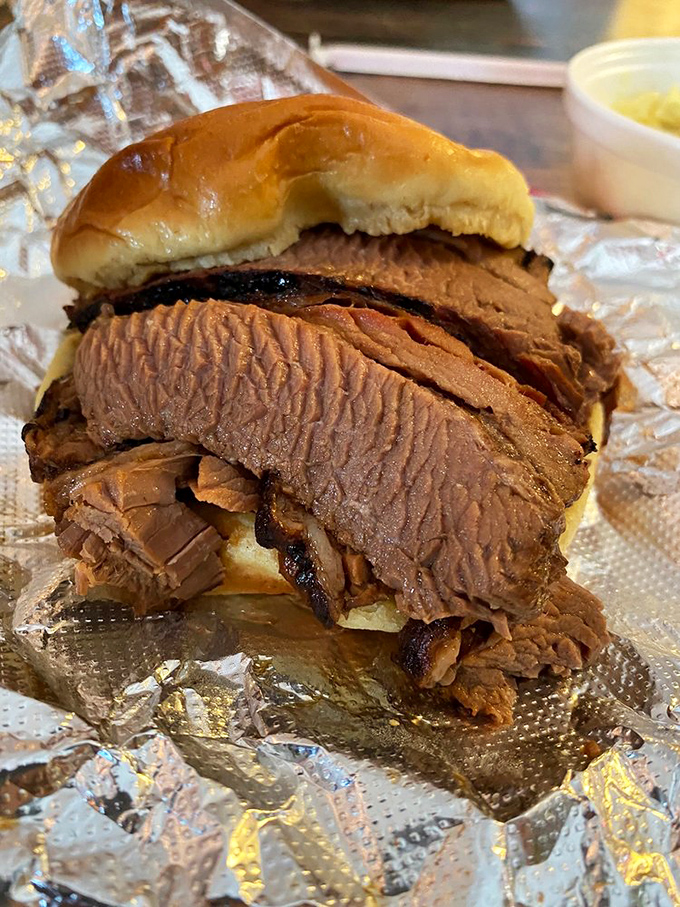Brisket sandwich architecture that defies physics&mdash;somehow managing to be both substantial and delicate. Meat engineering at its finest.