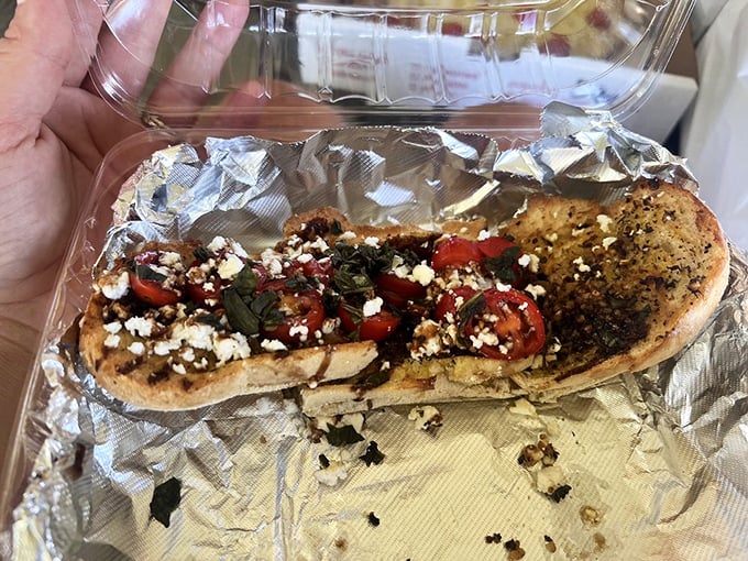 The bruschetta arrives like edible jewelry&mdash;tomatoes, feta, and herbs creating a symphony of flavors on perfectly toasted bread.