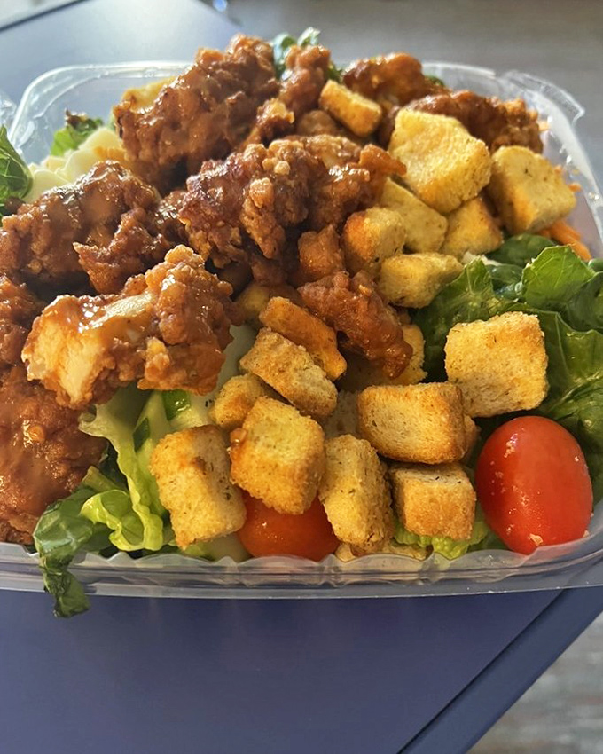 Buffalo chicken brings the heat to an otherwise innocent salad. This is what happens when bar food and health food have a delicious identity crisis.