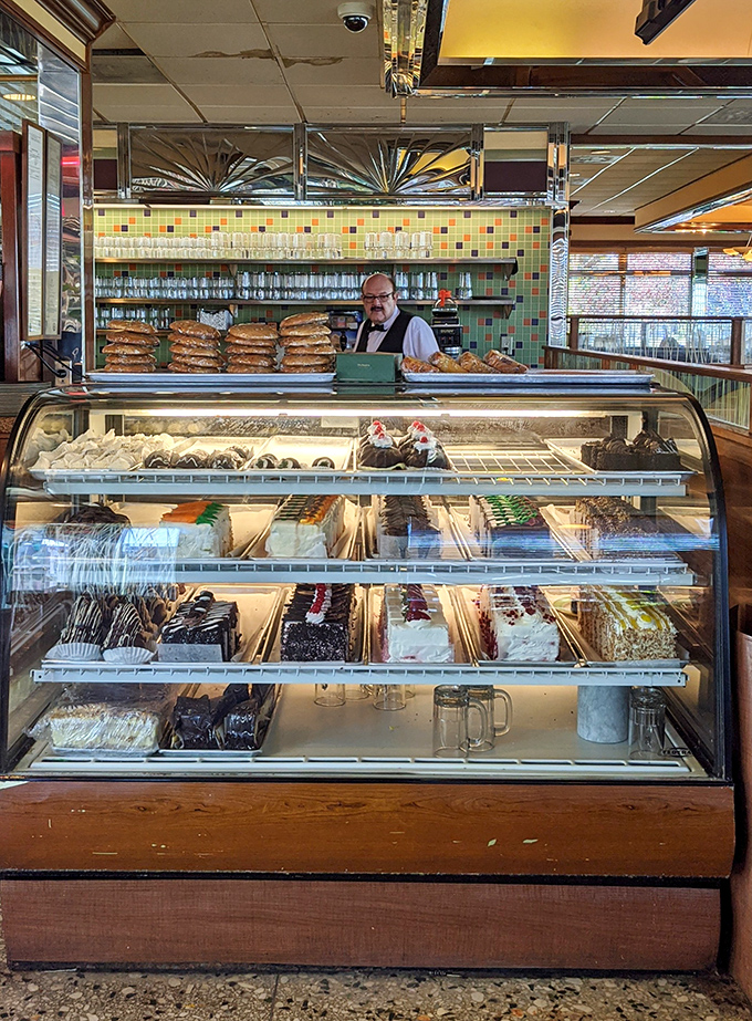 The dessert case—where willpower goes to die and "I'll just have coffee" turns into "and a slice of that... and that."
