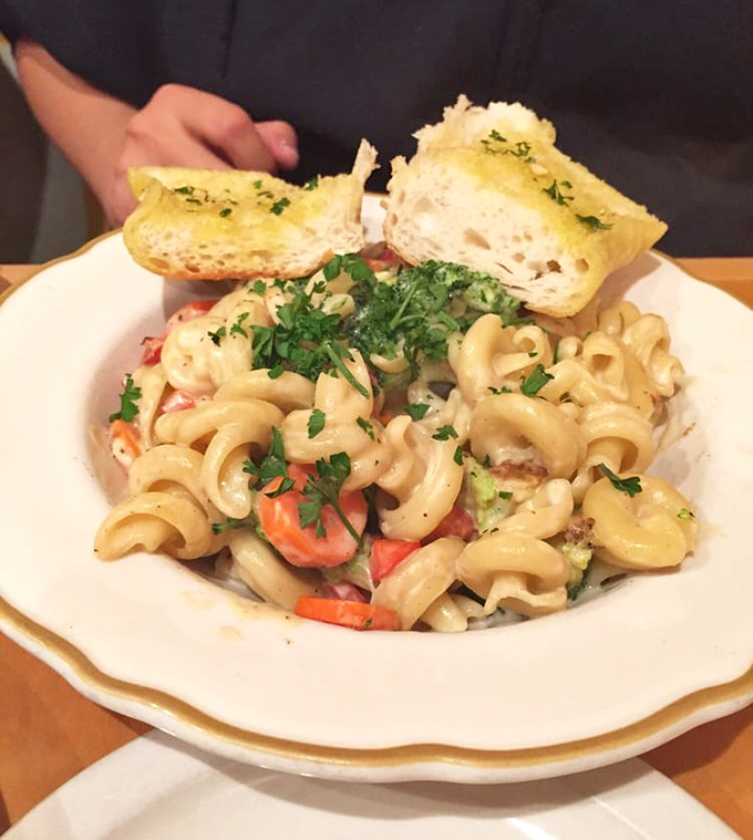 Campanella pasta that cradles the creamy sauce in its curls &ndash; comfort food that doesn't announce its plant-based credentials, it just delivers satisfaction.