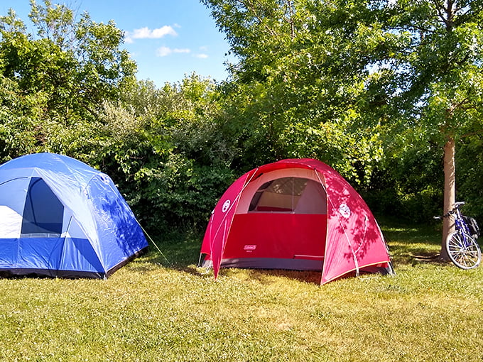 Colorful tents dot the landscape like modern nomadic villages. Home is where you stake your tent pegs. 