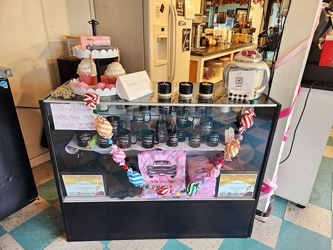 The gift shop display case offers pink-themed souvenirs&mdash;because the only thing better than eating here is taking a piece of it home.