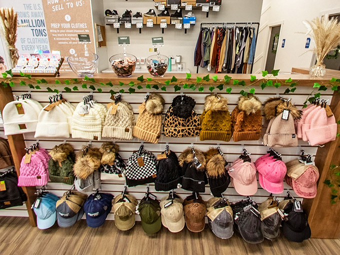 Hat hair be gone! This display of beanies, caps, and pom-poms proves accessories don't need to break the bank to make a statement.