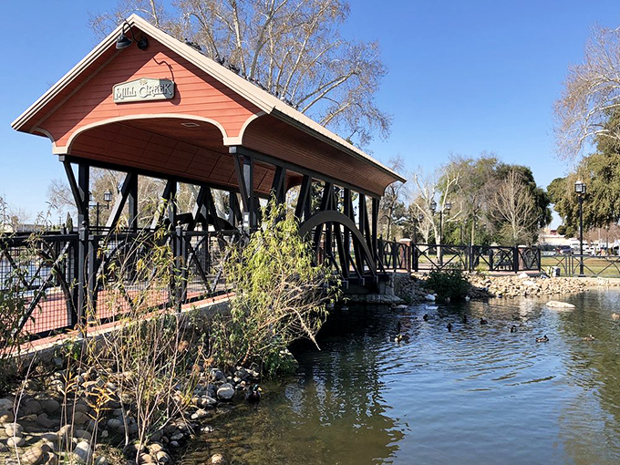 Mill Creek's charming covered bridge spans tranquil waters, offering storybook moments in a city that values substance over coastal zip codes.